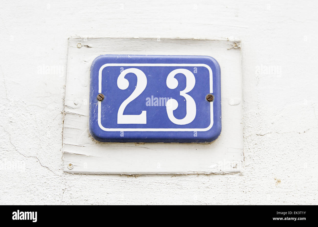 Number twenty-three on the wall of a house, detail of a number of ...