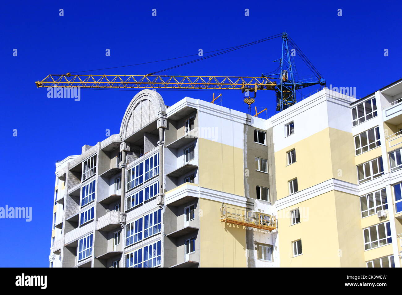 Crane lifting house hi-res stock photography and images - Alamy