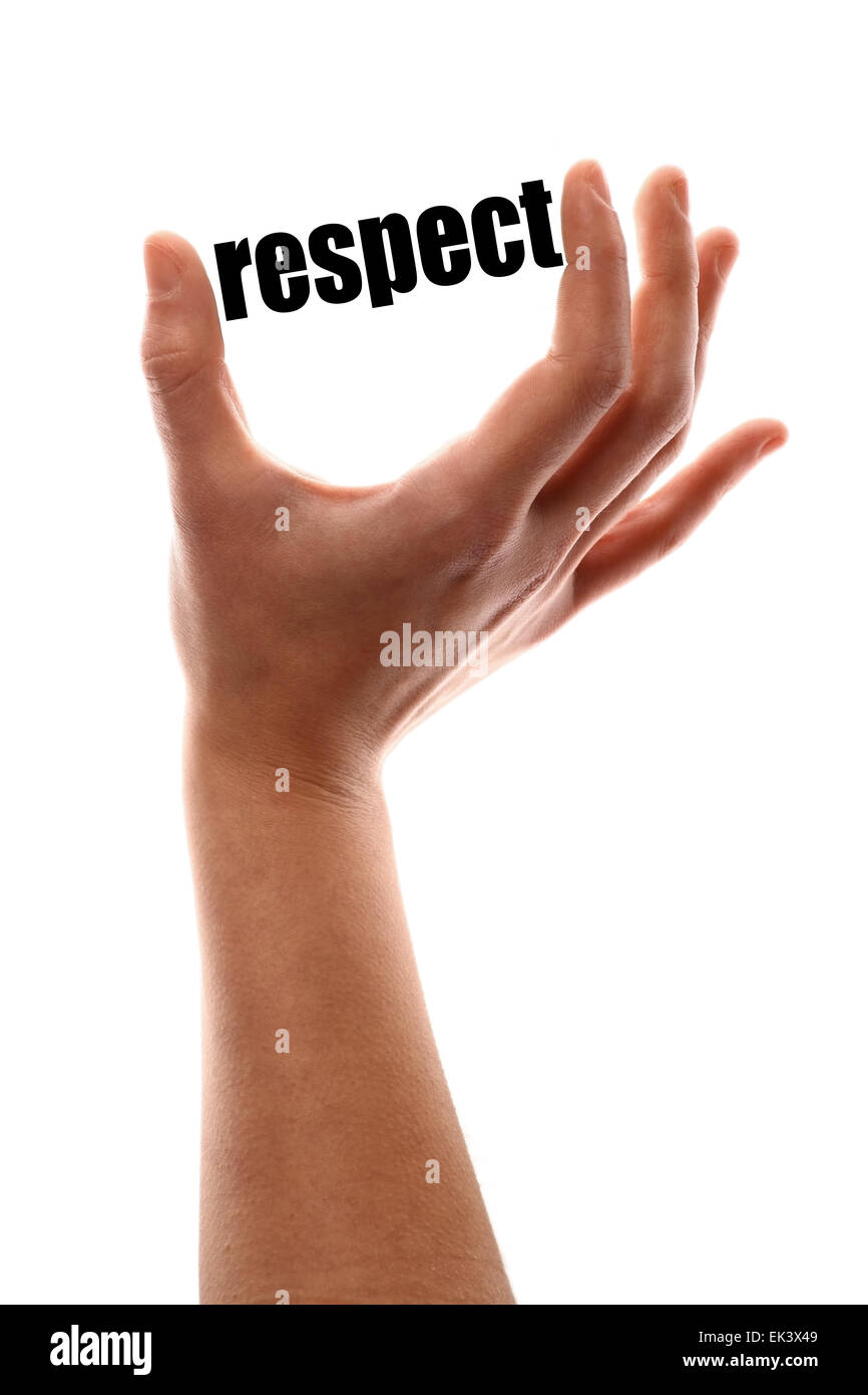Color vertical shot of a of a hand squeezing the word "respect Stock ...