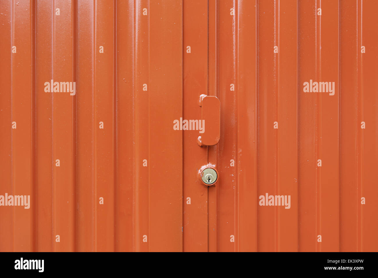 Red metal door, detail of a closed door painted red, protection and ...
