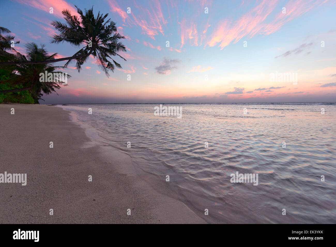 Tropical sunrise near the island beach at Maldives Stock Photo - Alamy