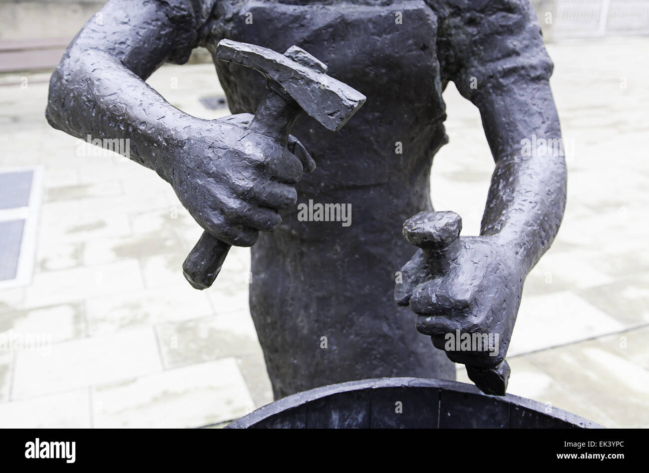 Bronze statue with a hammer, detail of a statue of a worker Stock Photo ...