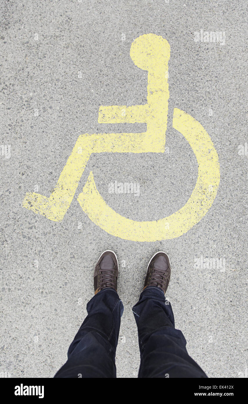 Handicapped sign on the floor, feet pointing signal for help Stock ...