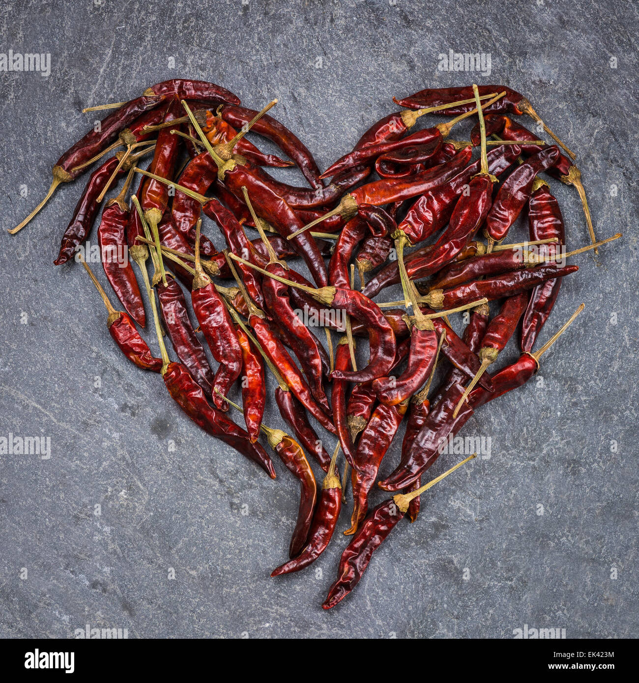 In the picture Italian chili peppers , arranged to form a red heart ...