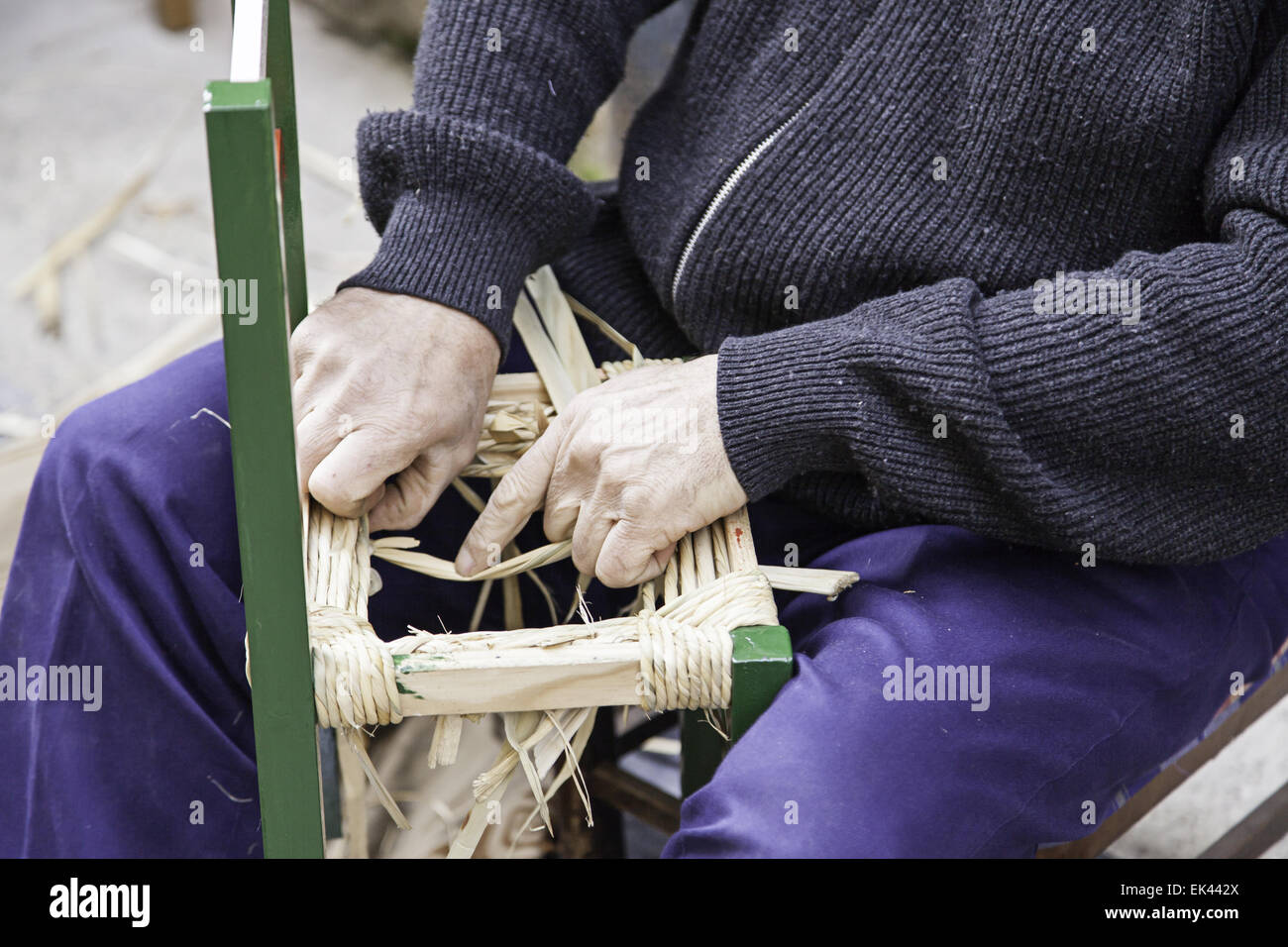 Craftsman wicker person working with his hands, arts and crafts Stock ...