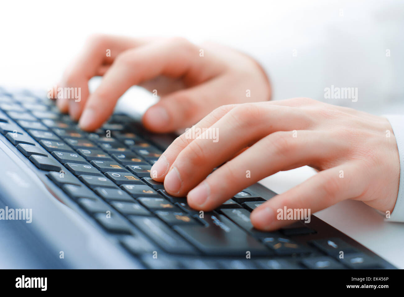 Business man studio typing hi-res stock photography and images - Alamy