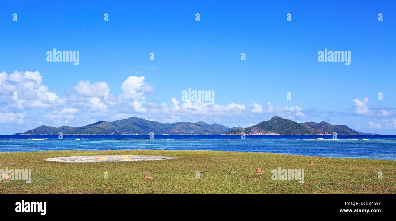 Helipad in island of La Digue on background of island Praslin Stock ...
