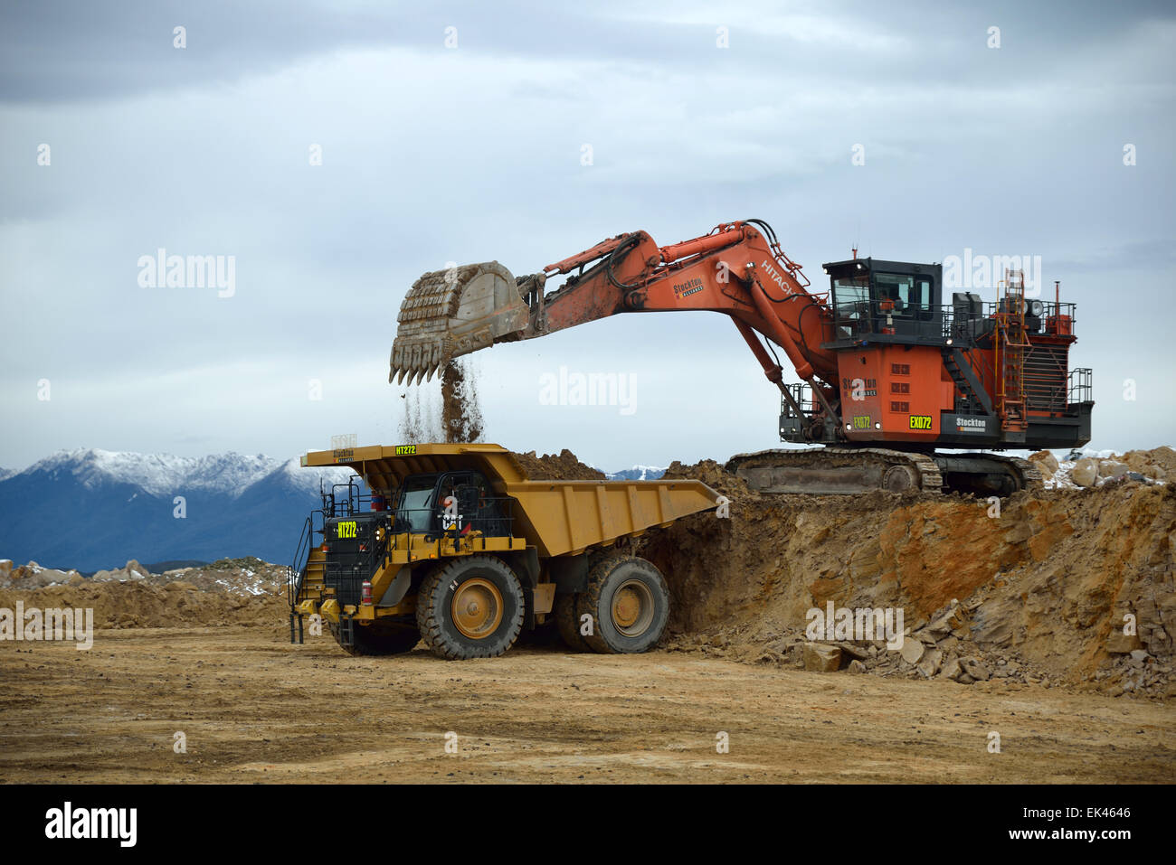 A 190 ton digger loads rock from a layer of overburden at open cast ...