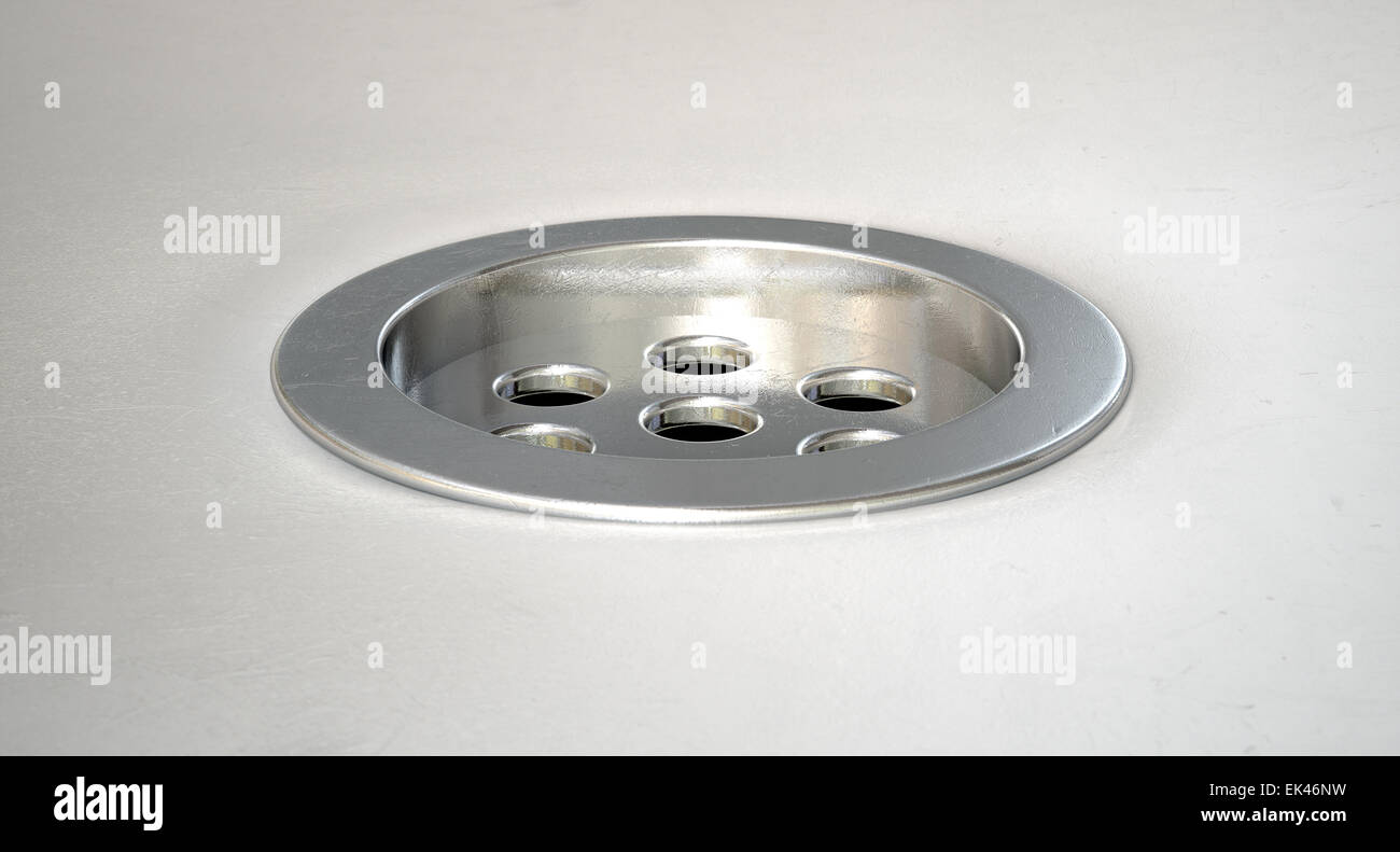 A closeup of a chrome plug hole set in a porcelain basin Stock Photo ...
