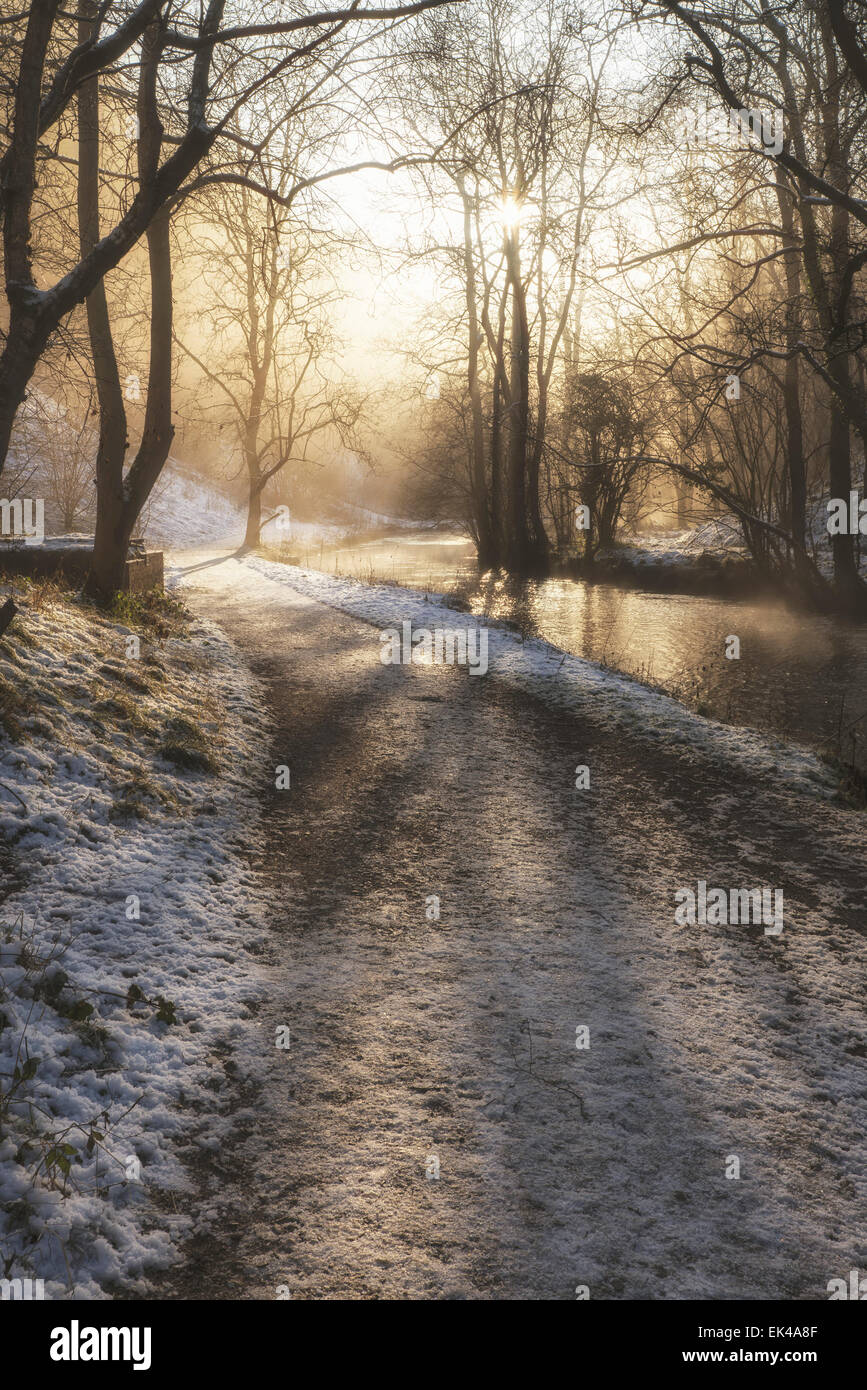 Beautiful Winter snow covered countryside landscape of river flowing ...