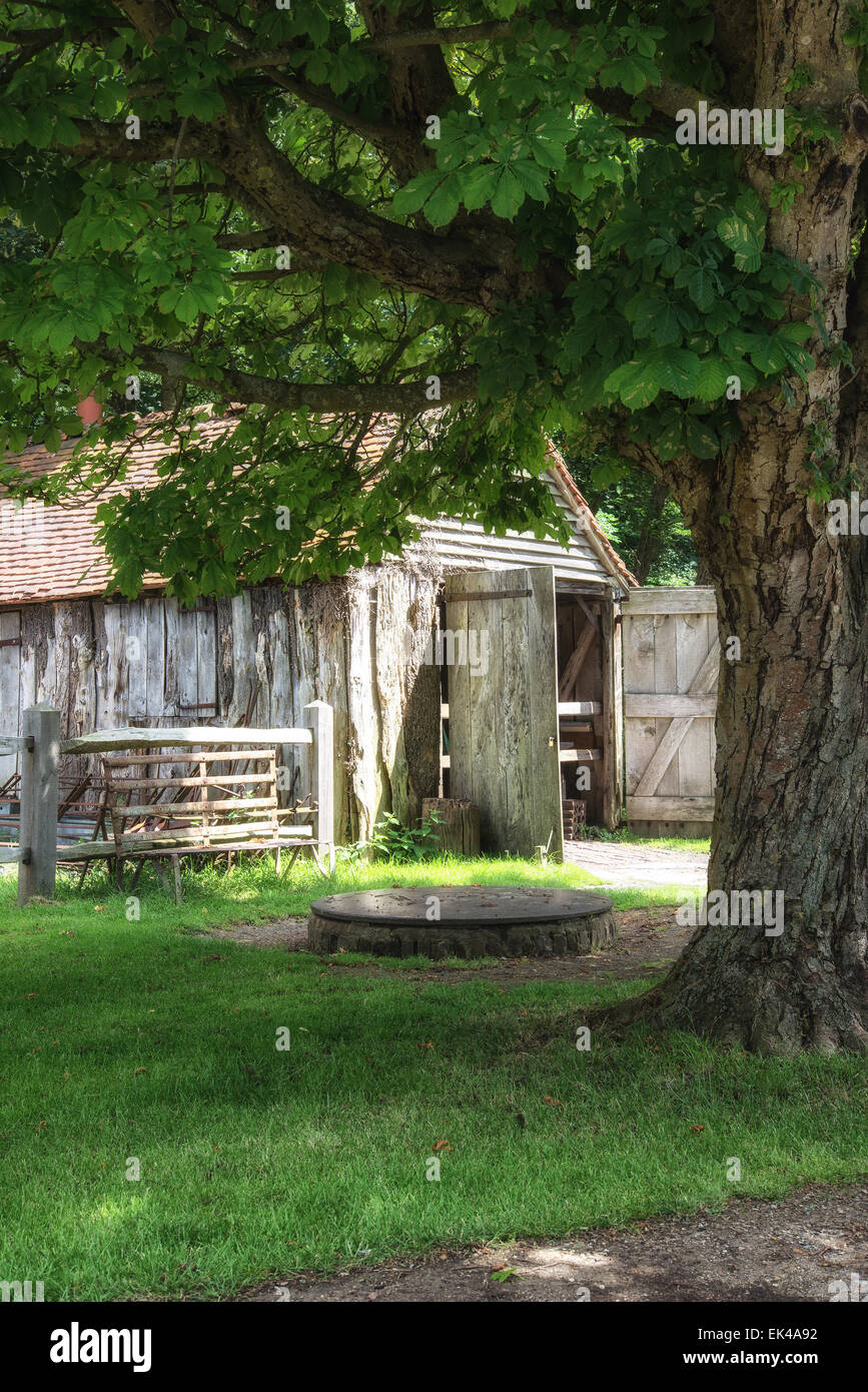 Medieval ironmonger shed in forest landscape setting Stock Photo - Alamy