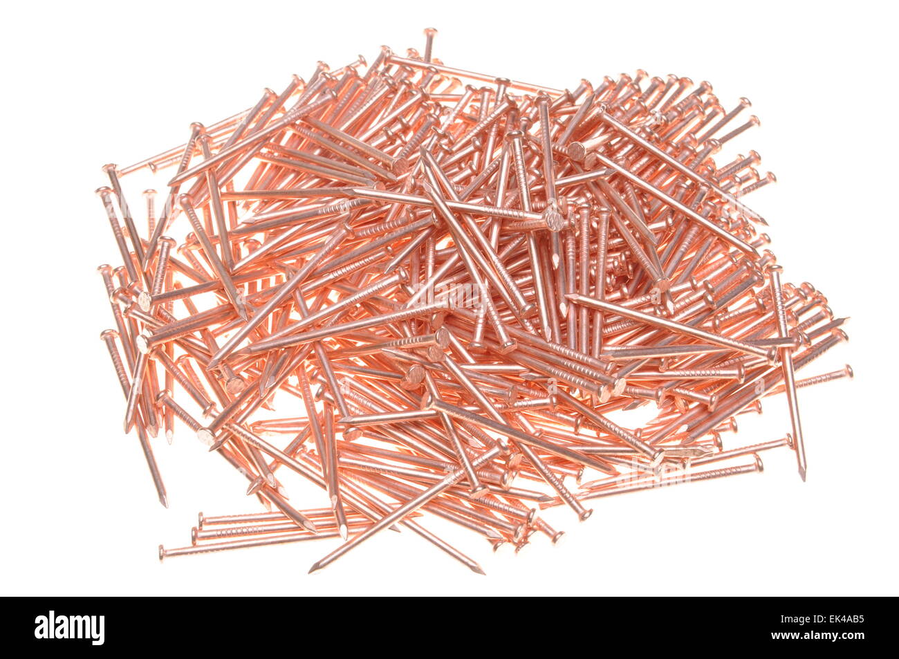 Pile of red nails isolated on white background Stock Photo - Alamy