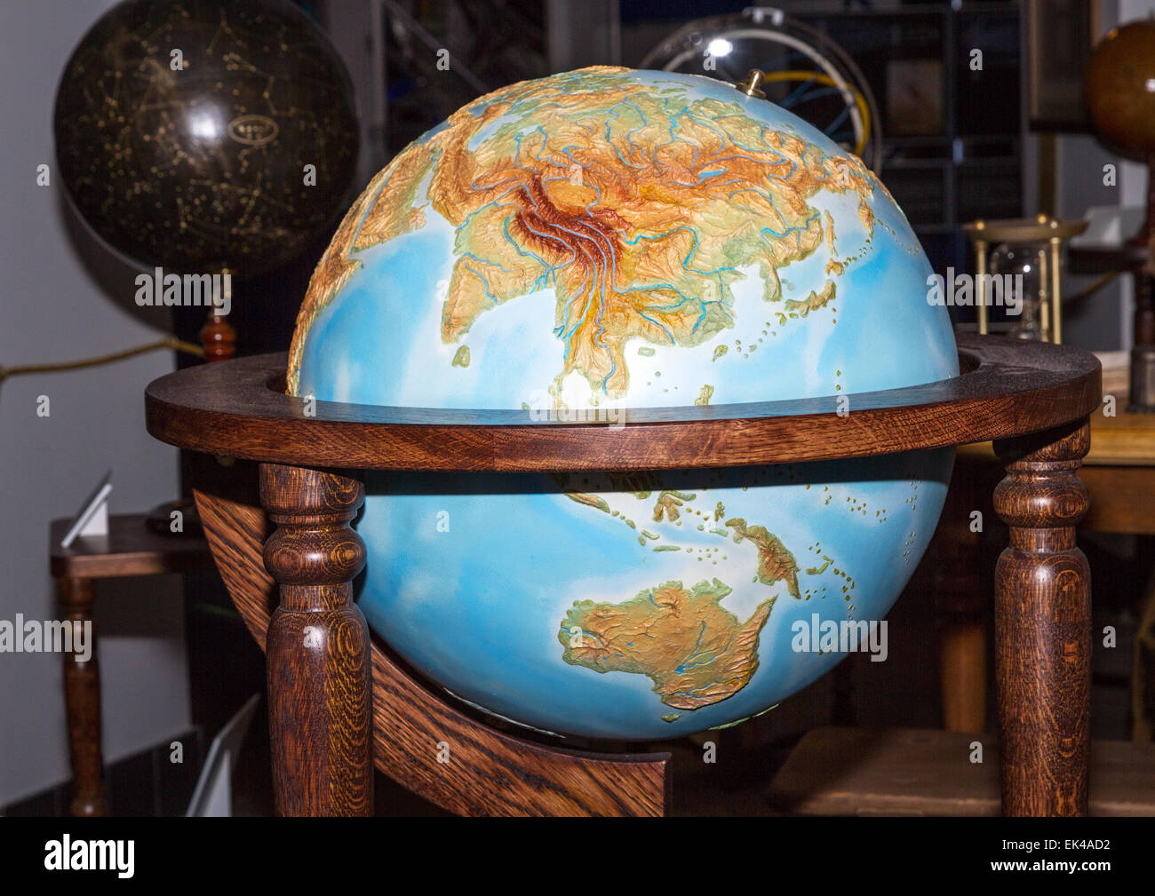 Close-up of a vintage globe on wooden poles Stock Photo - Alamy