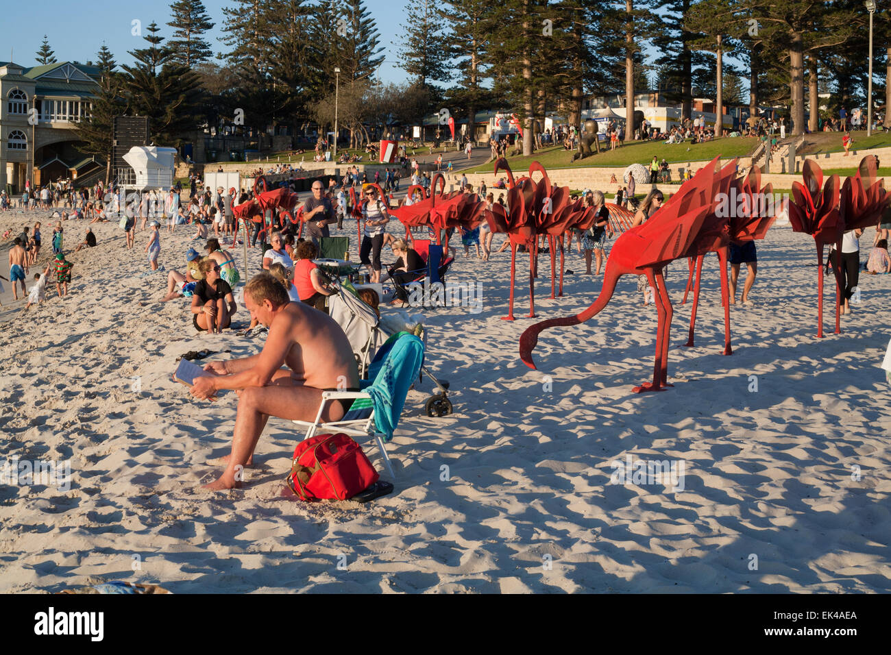 Beach goers mingle with art sculptures at the 2015 Sculpture By The Sea ...