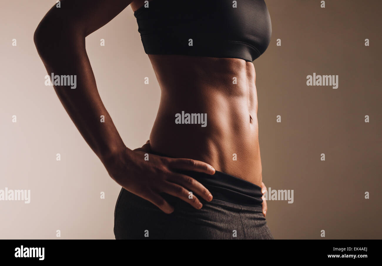 Cropped Image Of Womans Waist Perfect Abdominal Muscles Of Fit Female