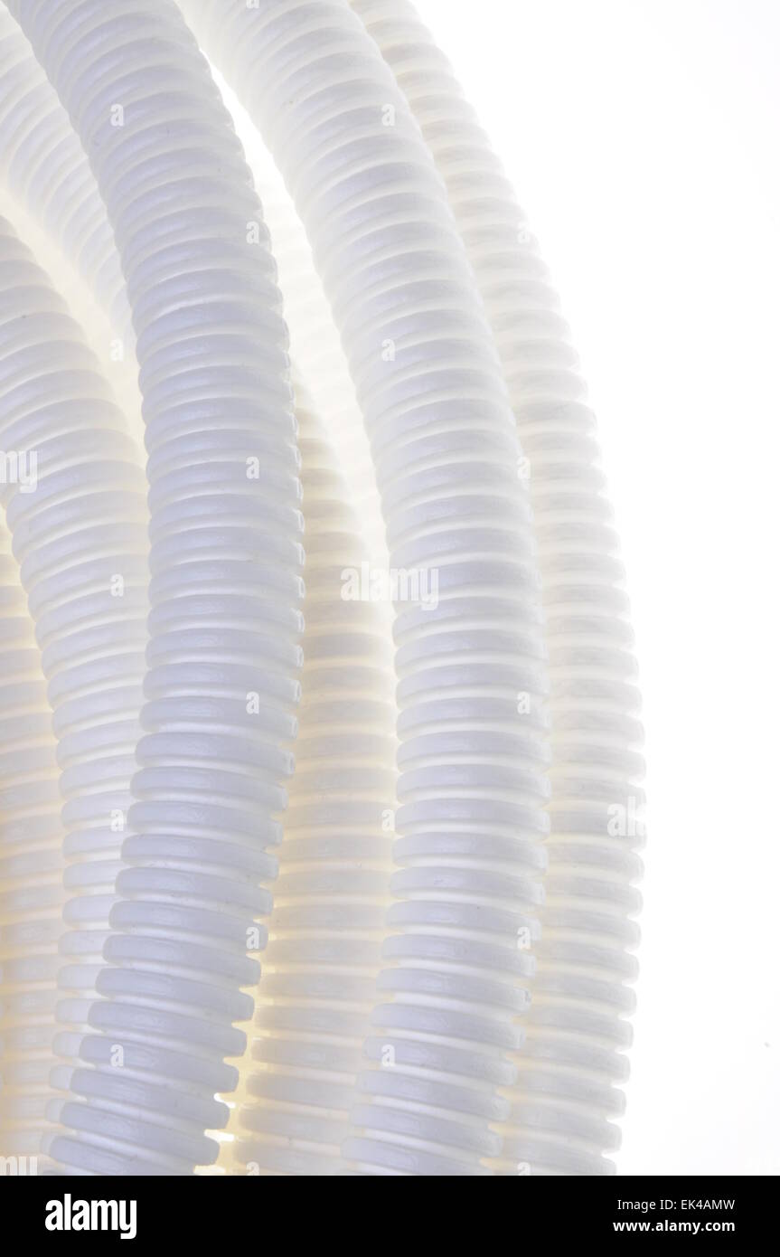 White plastic corrugated pipe isolated on white background Stock Photo ...