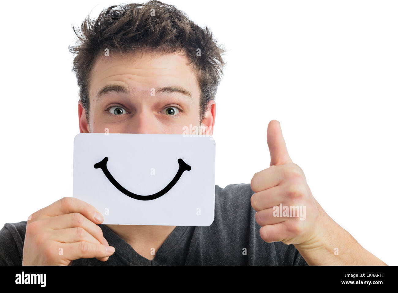 Happy Portrait of a Man Holding a Smiling Mood Board Isolated on White ...