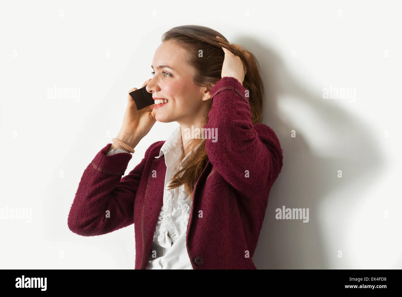 Italy, girl talking on the mobile phone Stock Photo - Alamy
