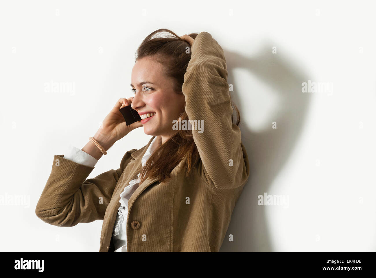 Italy, girl talking on the mobile phone Stock Photo - Alamy