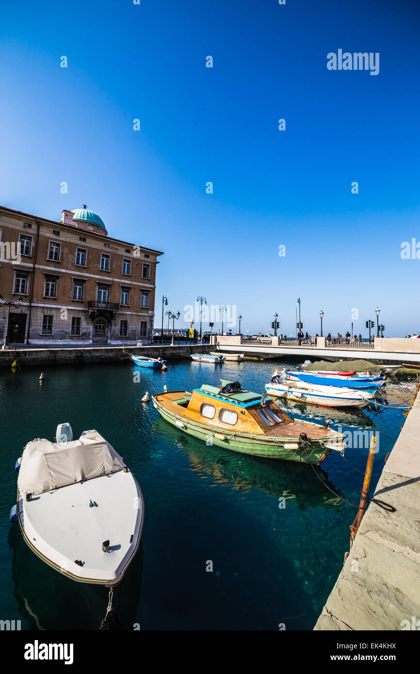 some boats in the canal in the center of Trieste Stock Photo - Alamy