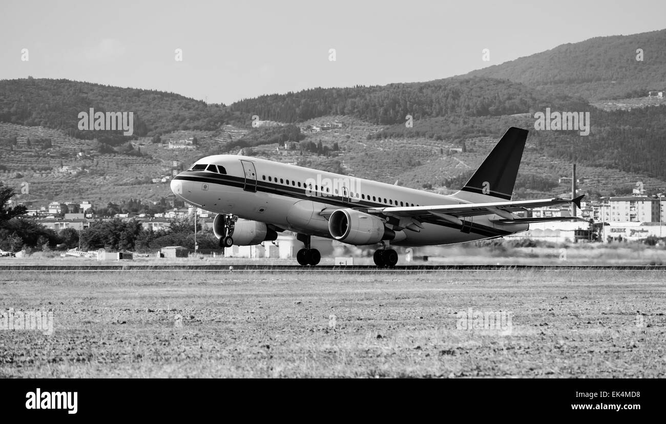 Italy, Tuscany, Florence International Airport, airplane take-off Stock ...