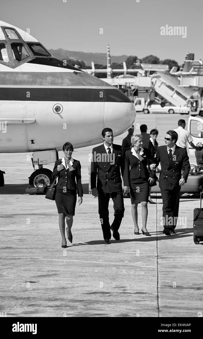 Italy, Sardinia, Olbia International Airport, flight assistants near an ...