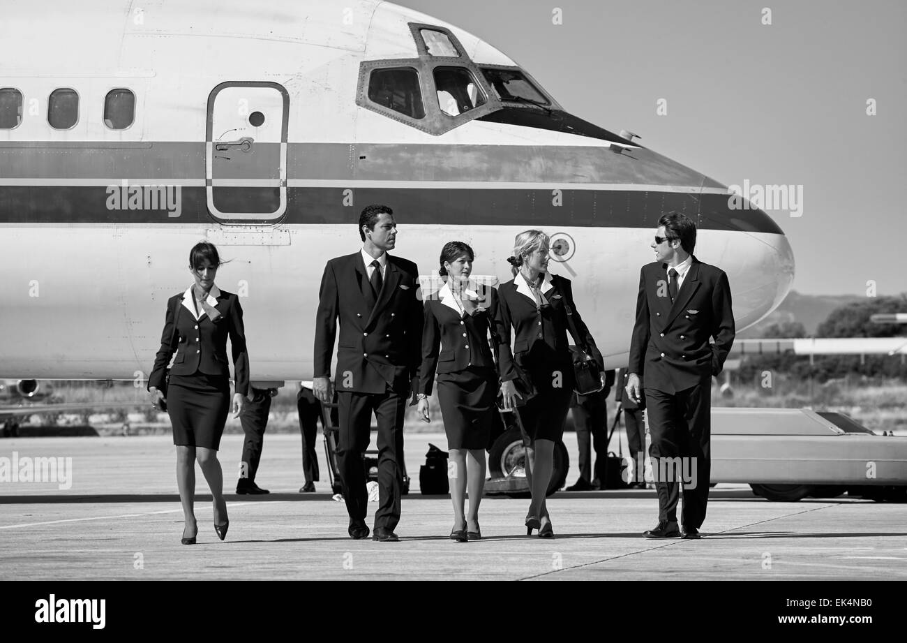 Flight attendant uniform Black and White Stock Photos & Images - Alamy