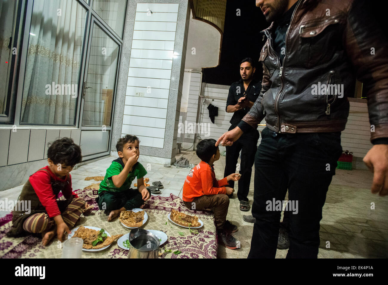 Muslim child eating bread hi-res stock photography and images - Alamy