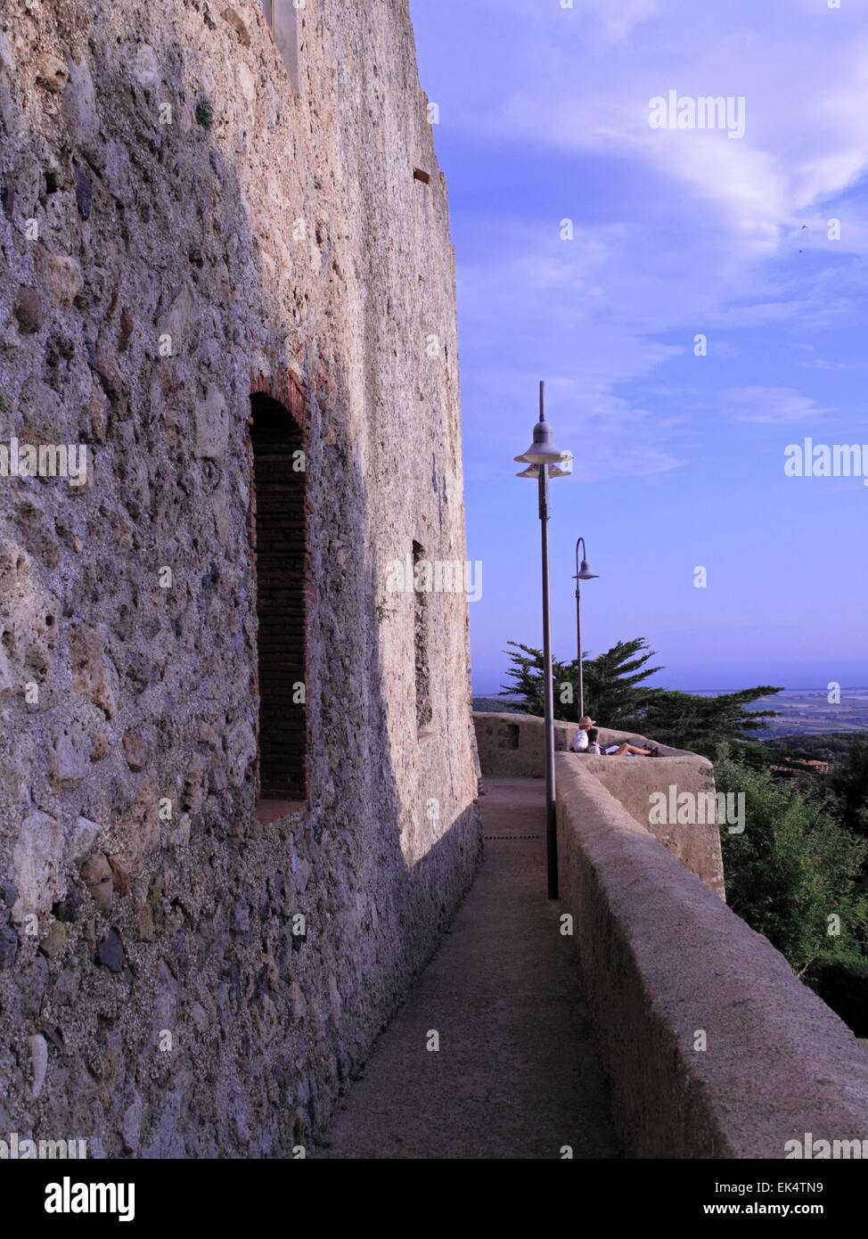 italy, tuscany, Capalbio town, tourists relax and enjoy the sunset on ...