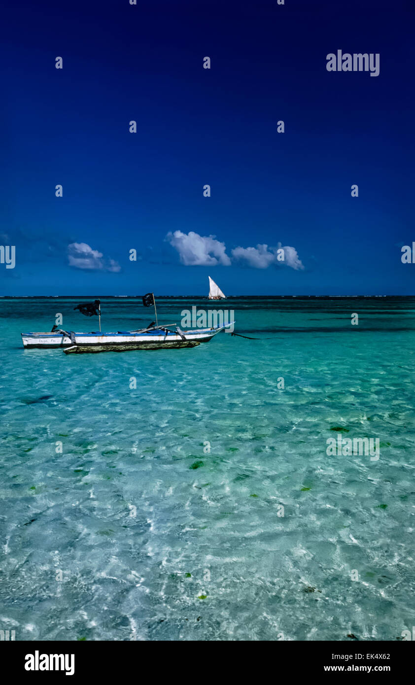 Kenya, Indian ocean, Malindi, view of a local fishing boat in shallow ...
