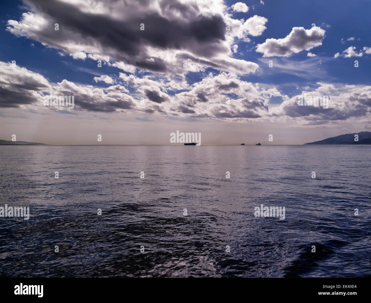 Italy, Sicily, Messina, cargo ships in the Sicily Channel Stock Photo ...