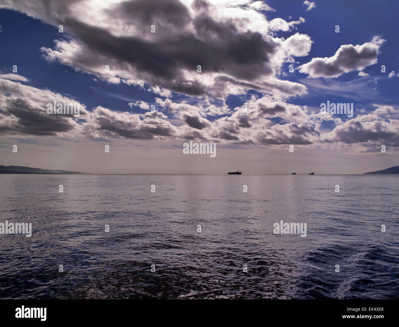 Italy, Sicily, Messina, cargo ships in the Sicily Channel Stock Photo ...