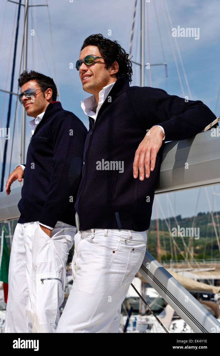 Italy, Tuscany, young sailors dressed casual on a sailing boat Stock ...