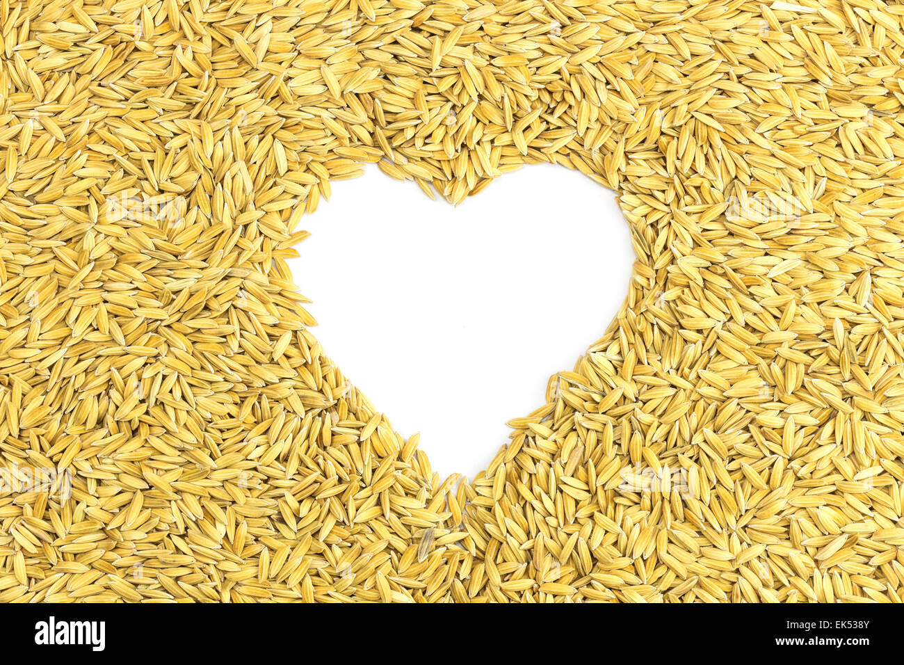 Yellow paddy jasmine rice isolated on white background Stock Photo - Alamy