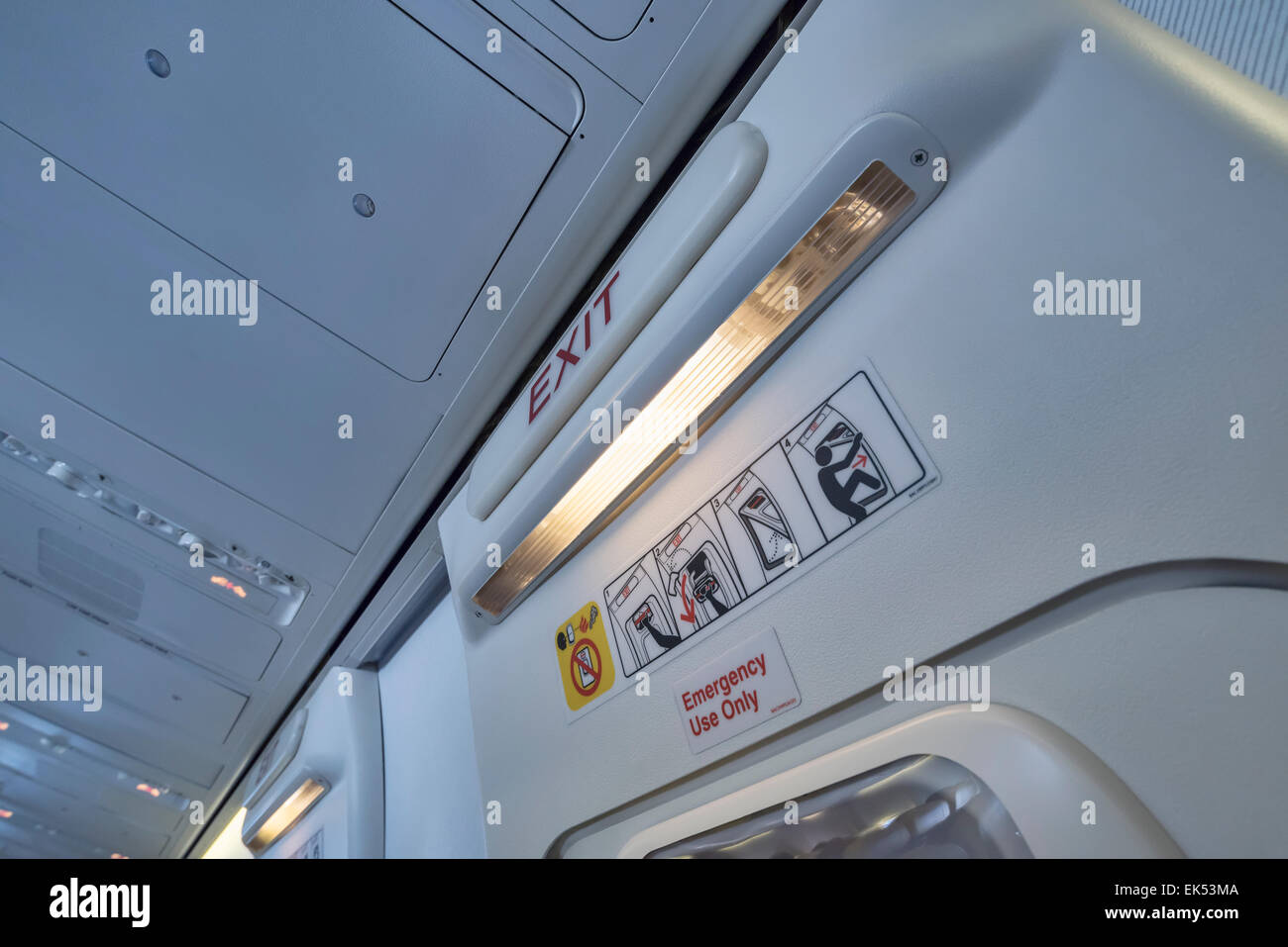 Italy, airplane cabine, emergency exit light Stock Photo - Alamy