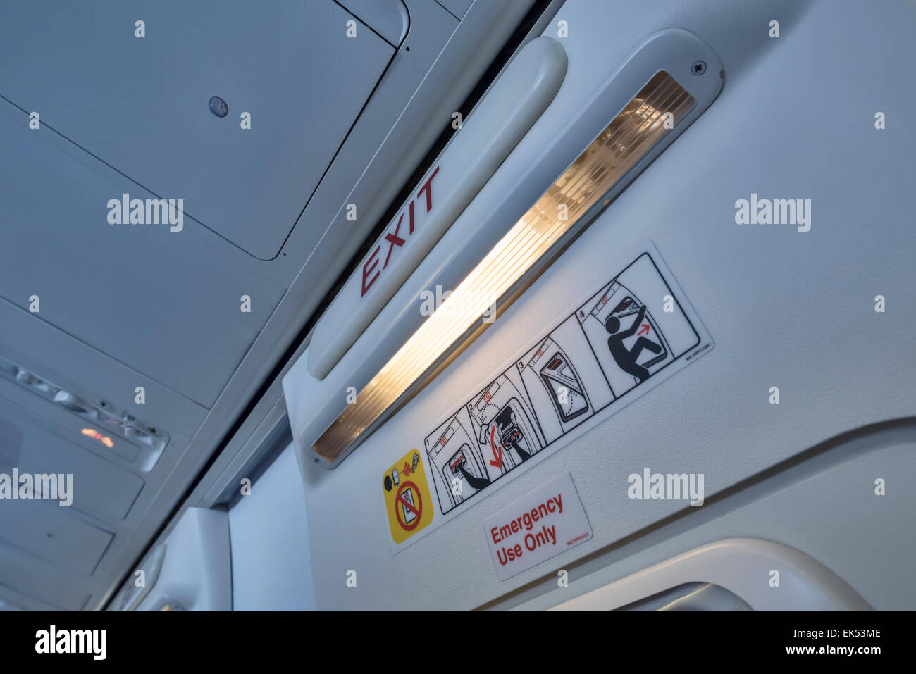 Italy, airplane cabine, emergency exit light Stock Photo - Alamy