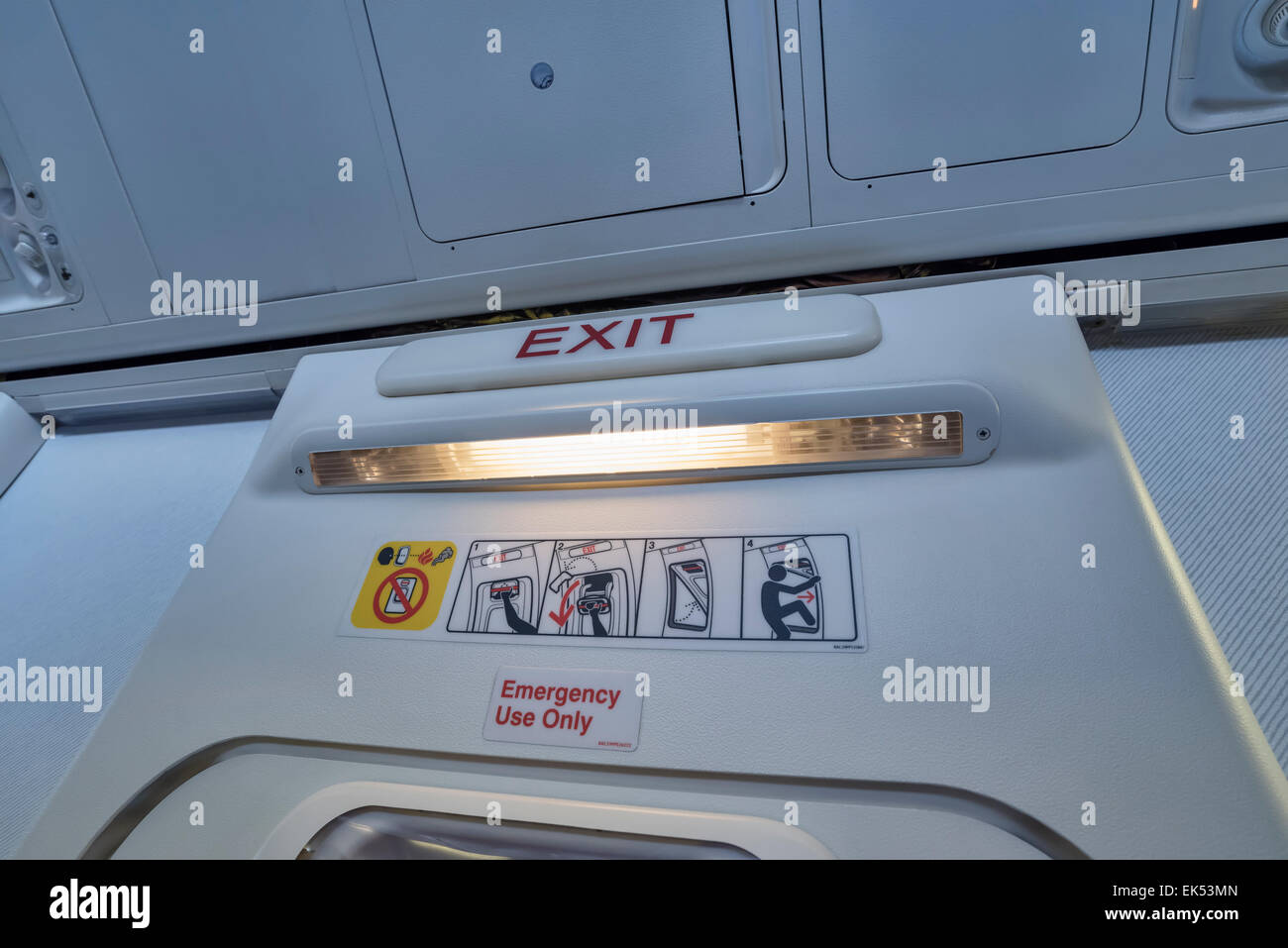 Italy, airplane cabine, emergency exit light Stock Photo - Alamy