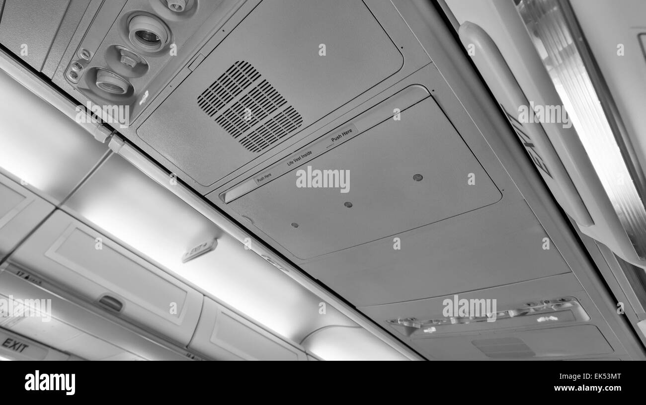 Airplane emergency exit Black and White Stock Photos & Images - Alamy