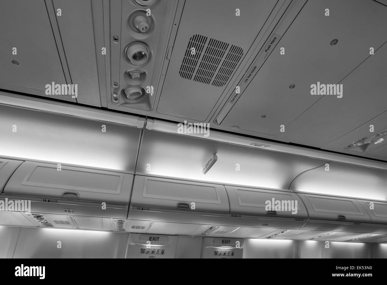 Italy, airplane cabin, emergency exit lights Stock Photo - Alamy