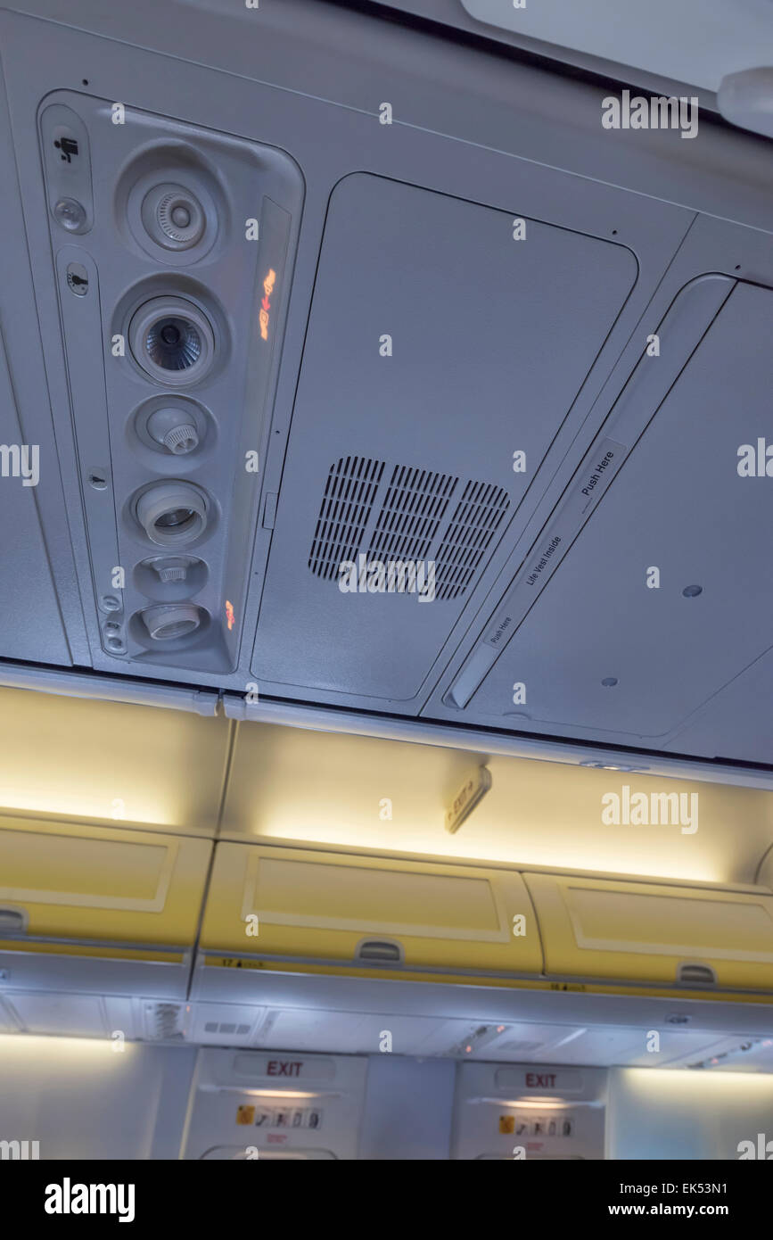 Italy, airplane cabin, emergency exit lights Stock Photo - Alamy