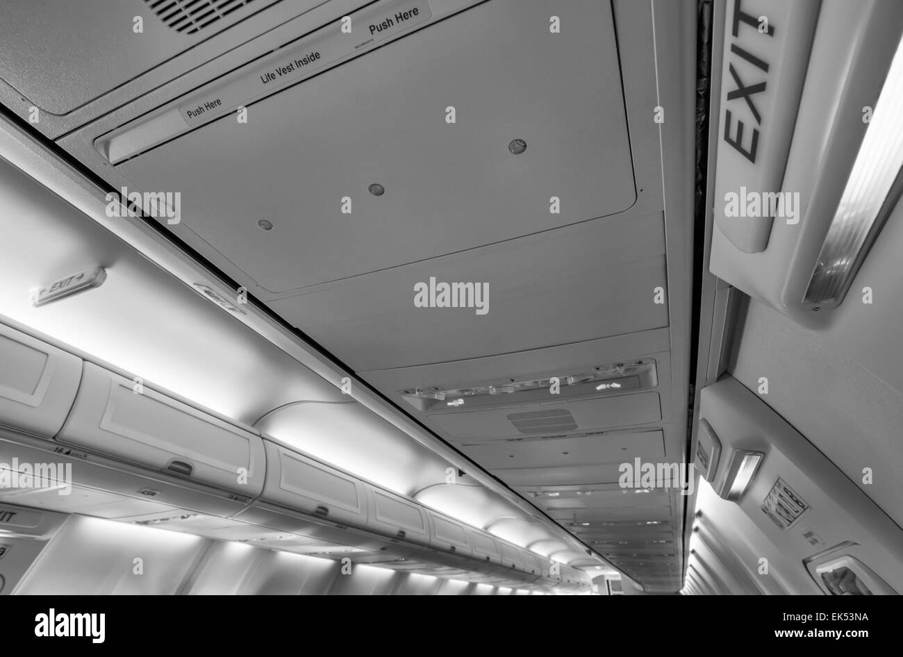 Italy, airplane cabin, emergency exit lights Stock Photo - Alamy
