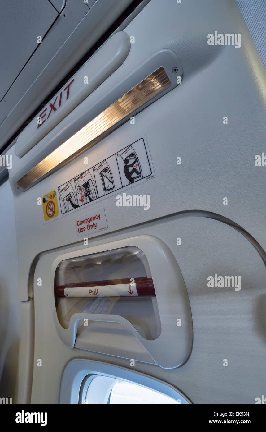 Italy, airplane cabine, emergency exit light Stock Photo - Alamy