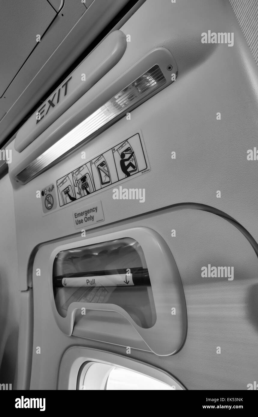 Italy, airplane cabine, emergency exit light Stock Photo - Alamy