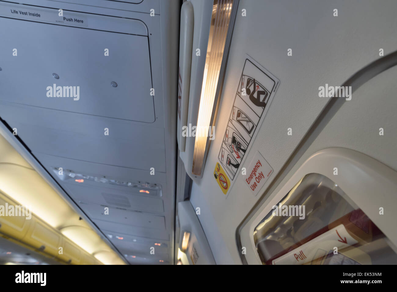 Italy, airplane cabine, emergency exit light Stock Photo - Alamy