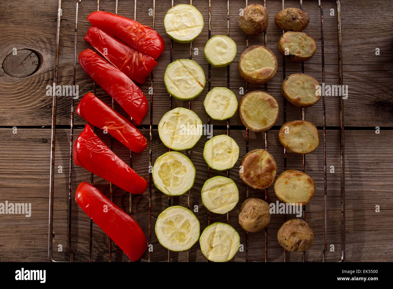 Shot of pерреr, marrow, potatoes on grill Stock Photo - Alamy