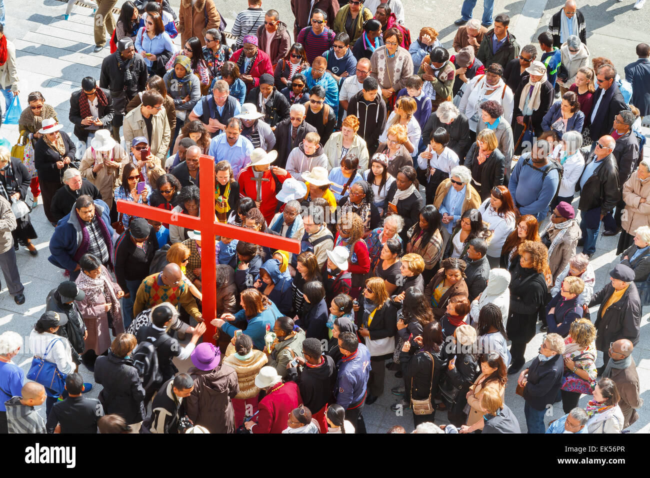 Believers with a cross in Holy Week Stock Photo - Alamy