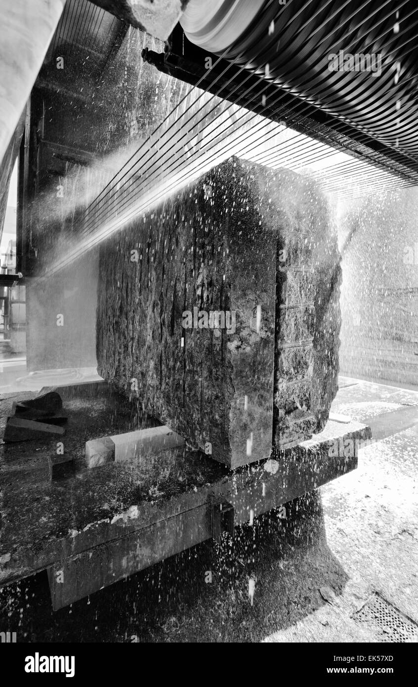 Italy, marble factory, marble cooled with water while being cut ...