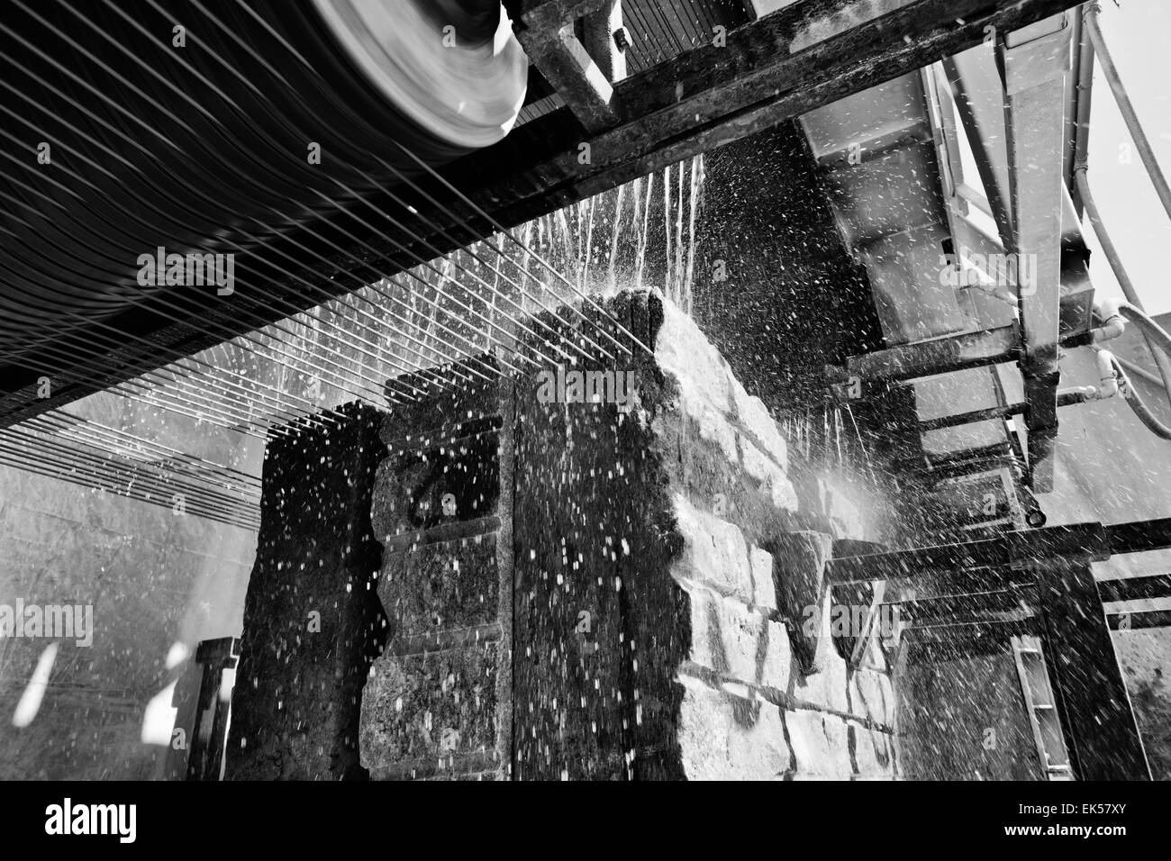 Italy, marble factory, marble cooled with water while being cut ...
