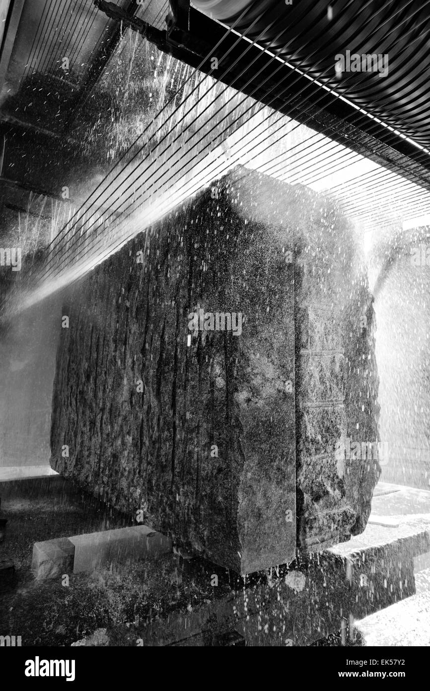 Italy, marble factory, marble cooled with water while being cut ...