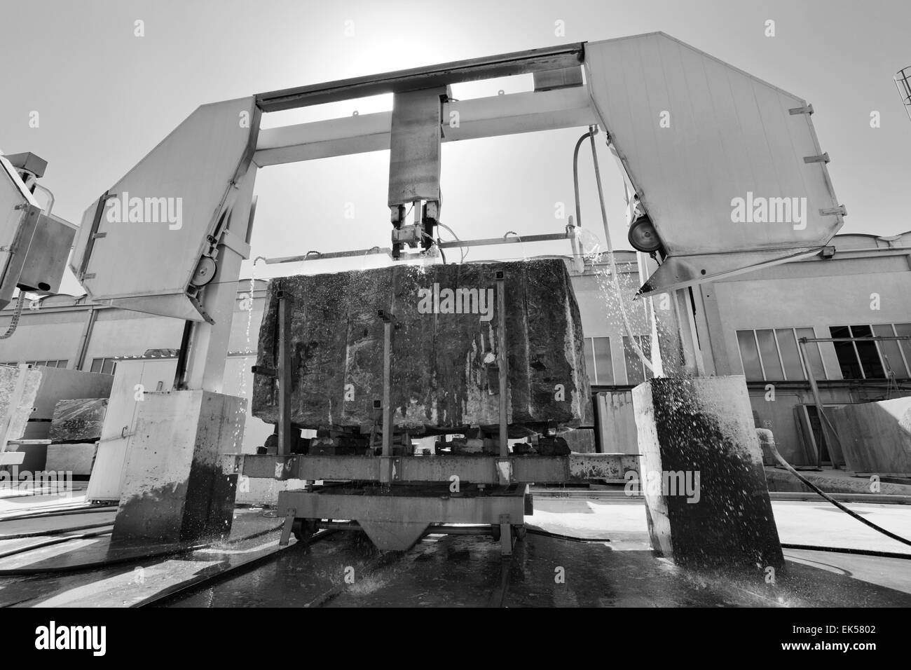Italy, marble factory, marble cooled with water while being cut ...